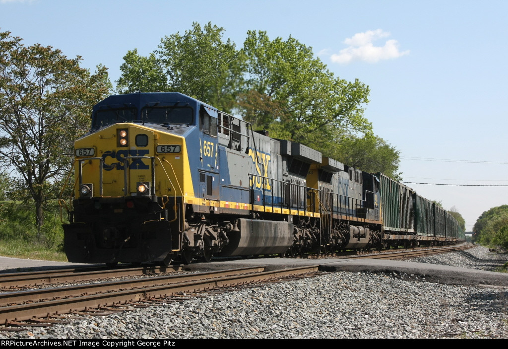 CSX 657 and train Q703